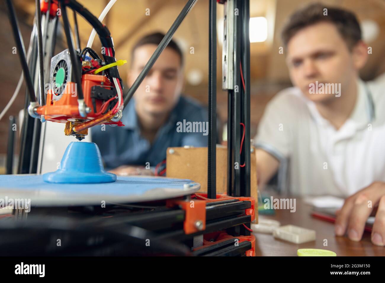 New generation of 3D Printing Machine printing a piece of plastic. For ...