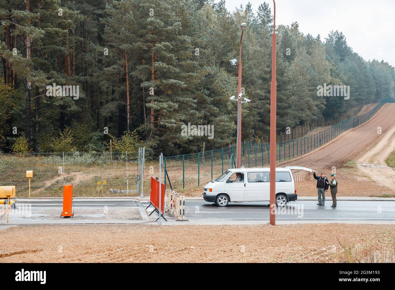 Grodno, Belarus - November 15, 2013: A female border guard checks the ...