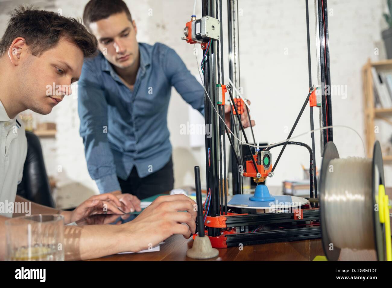 New generation of 3D Printing Machine printing a piece of plastic. For ...
