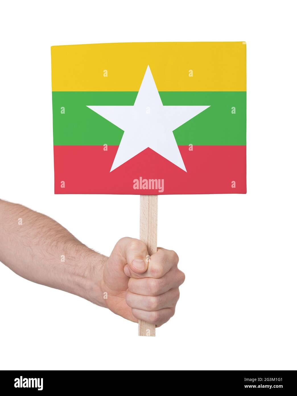 Hand holding small card - Flag of Myanmar Stock Photo - Alamy