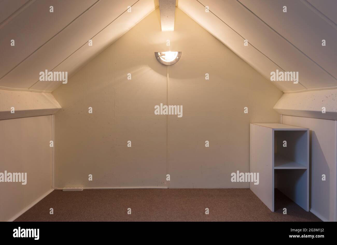 Empty attic room interior Stock Photo - Alamy