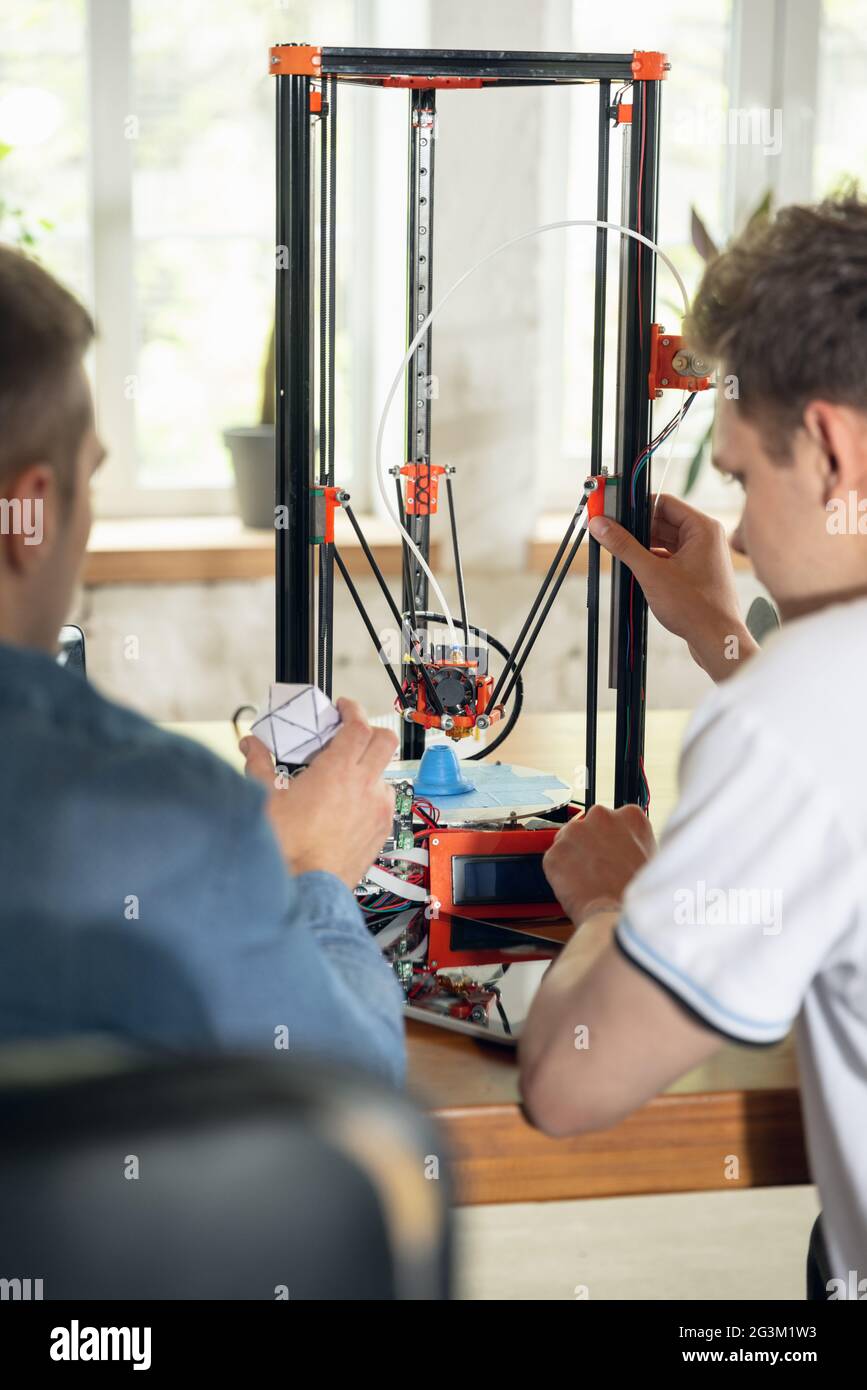 New generation of 3D Printing Machine printing a piece of plastic. For ...