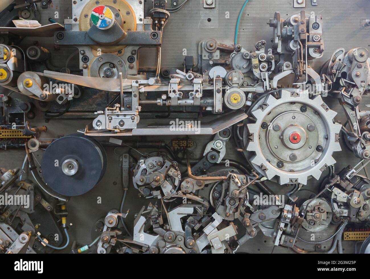 Complex old machine for packing teabags Stock Photo - Alamy