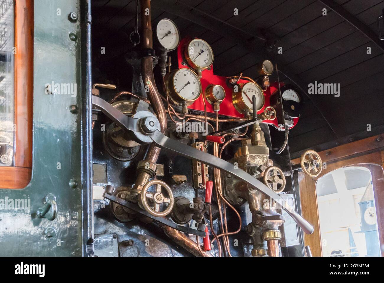 Vintage locomotive - Controling an old train Stock Photo - Alamy