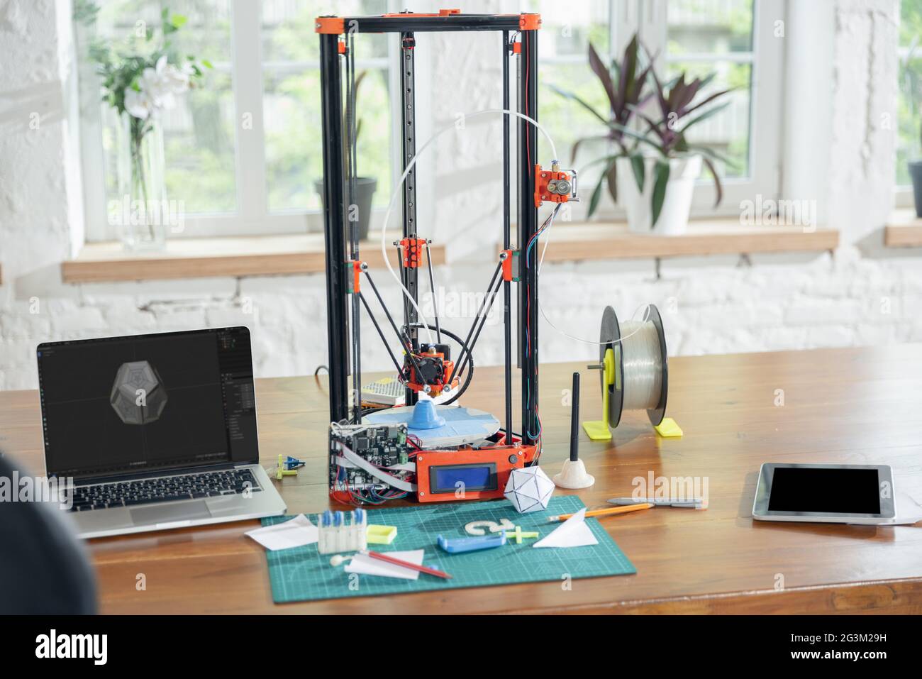 New generation of 3D Printing Machine printing a piece of plastic. For ...