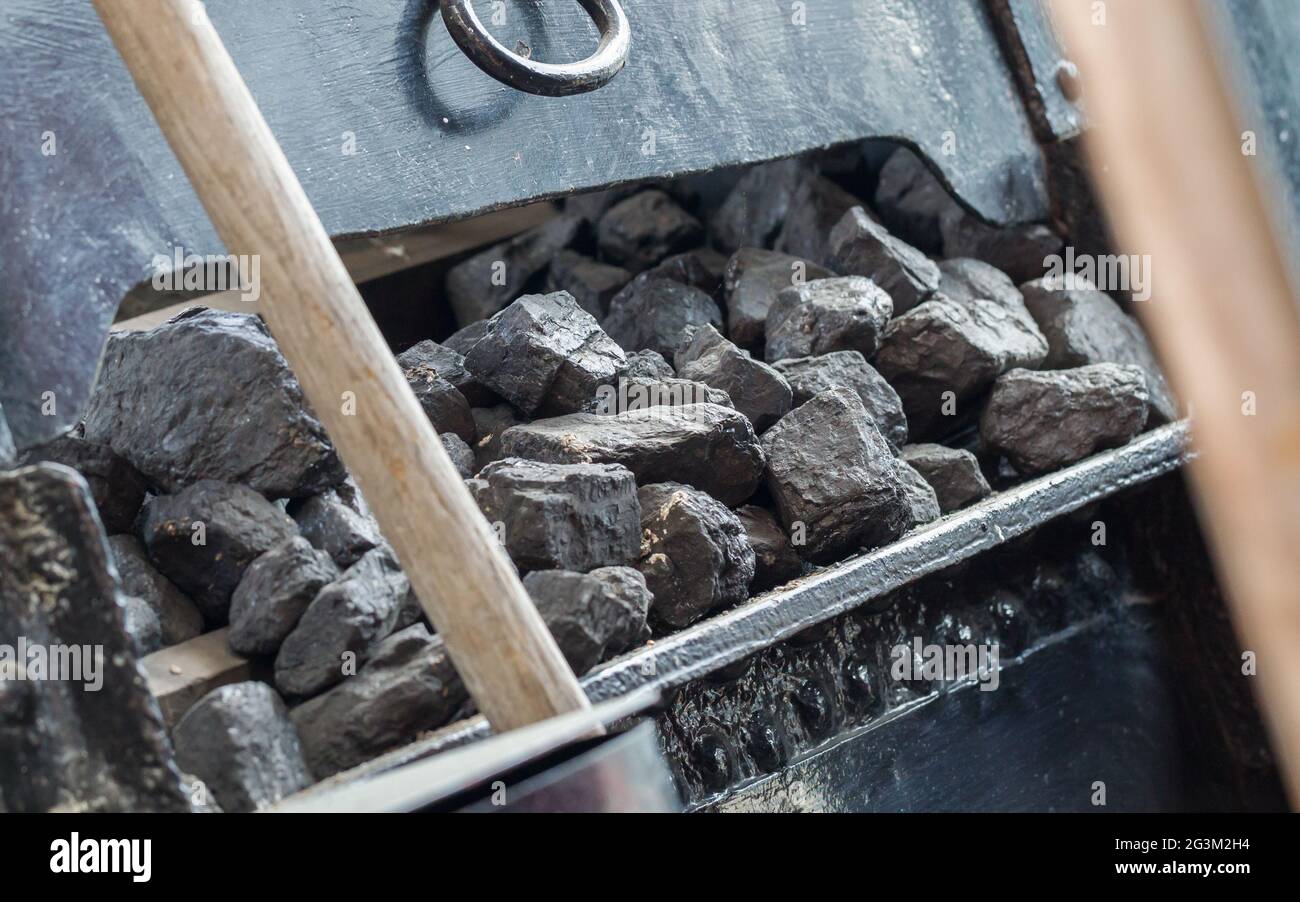 Coal used for a vintage steam locomotive Stock Photo - Alamy
