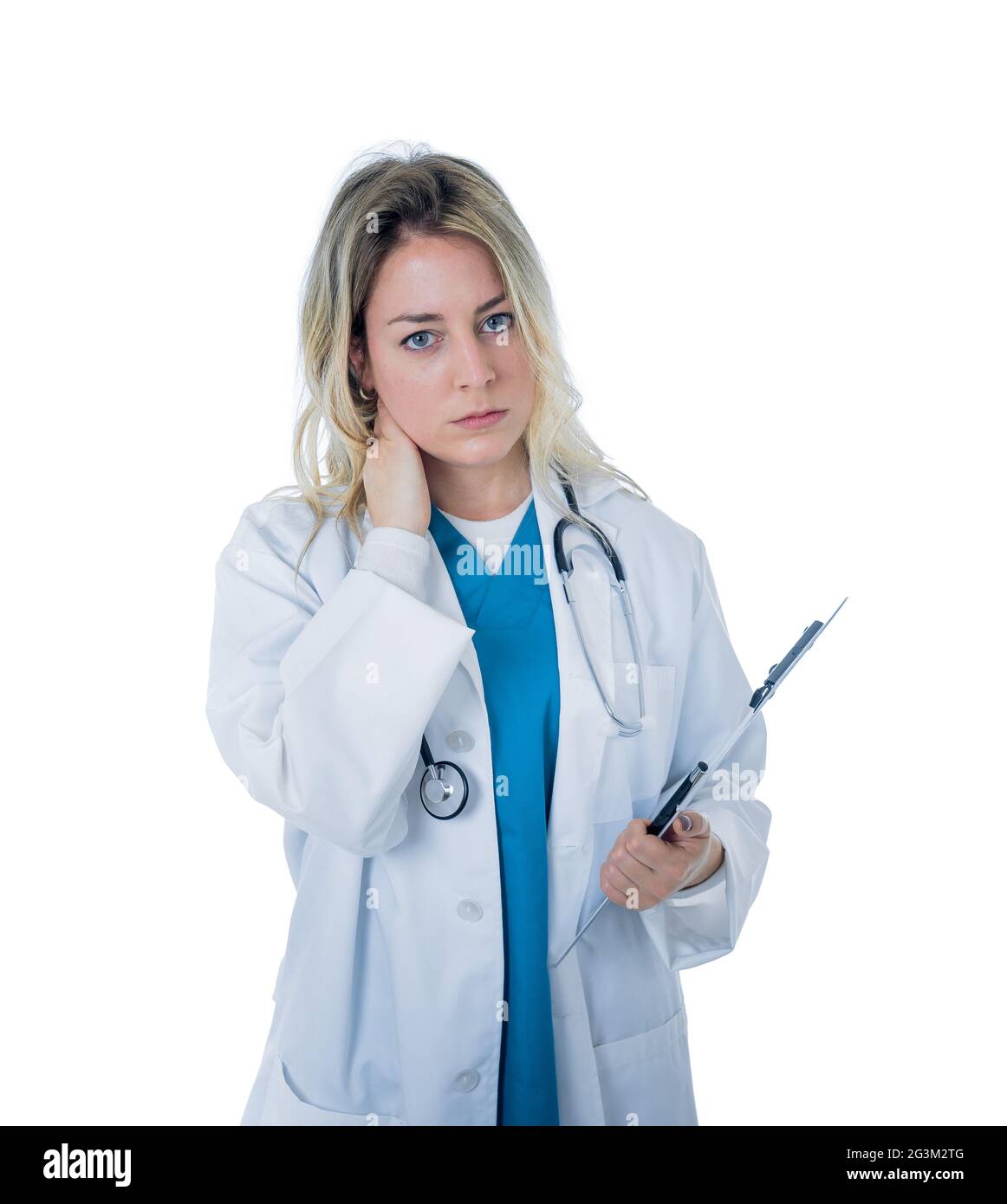 Overwhelmed female doctor or nurse wearing white coat over green scrub ...
