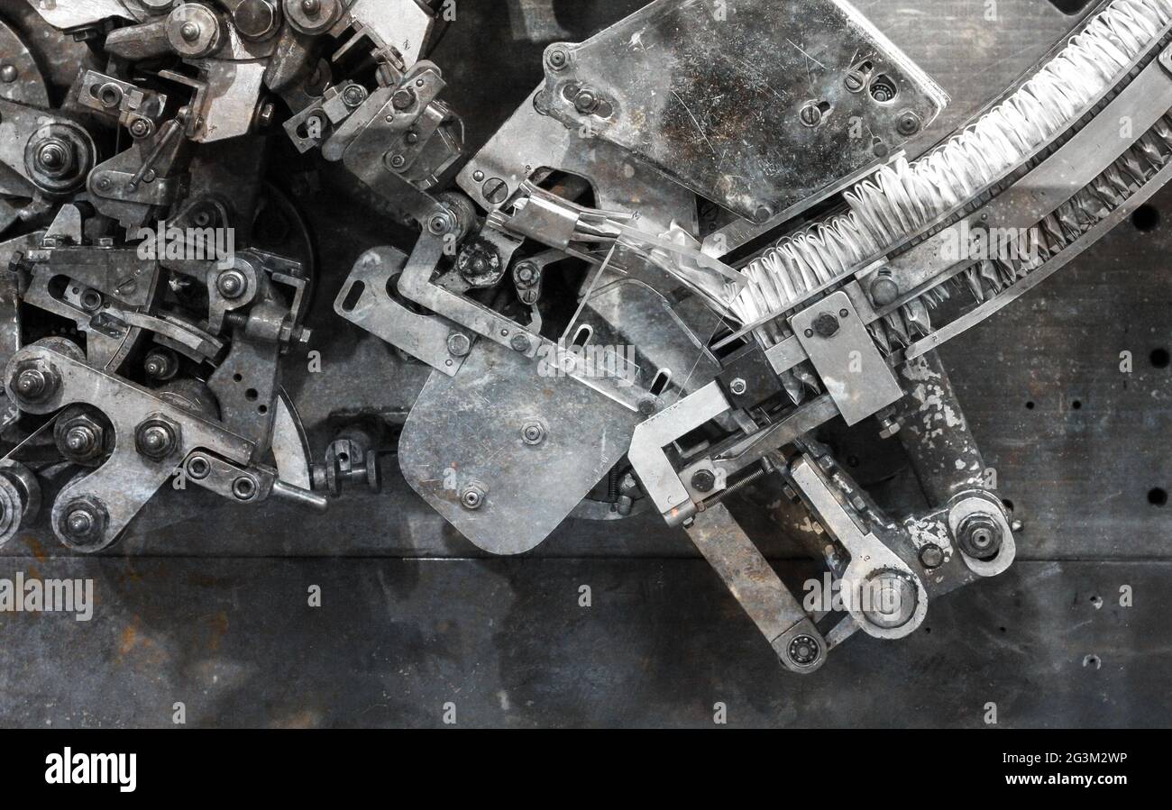 Complex old machine for packing teabags Stock Photo - Alamy