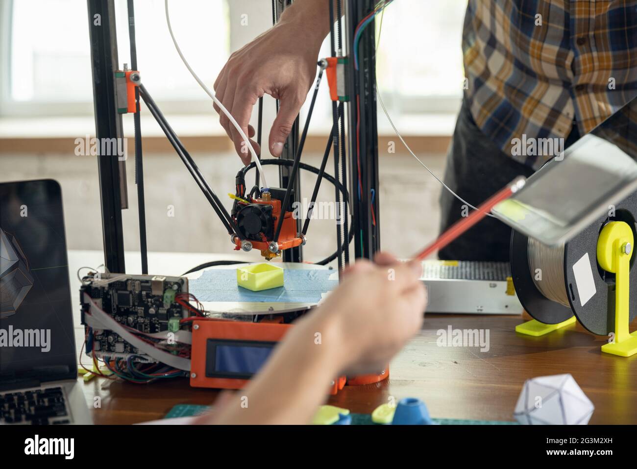 New generation of 3D Printing Machine printing a piece of plastic. For ...