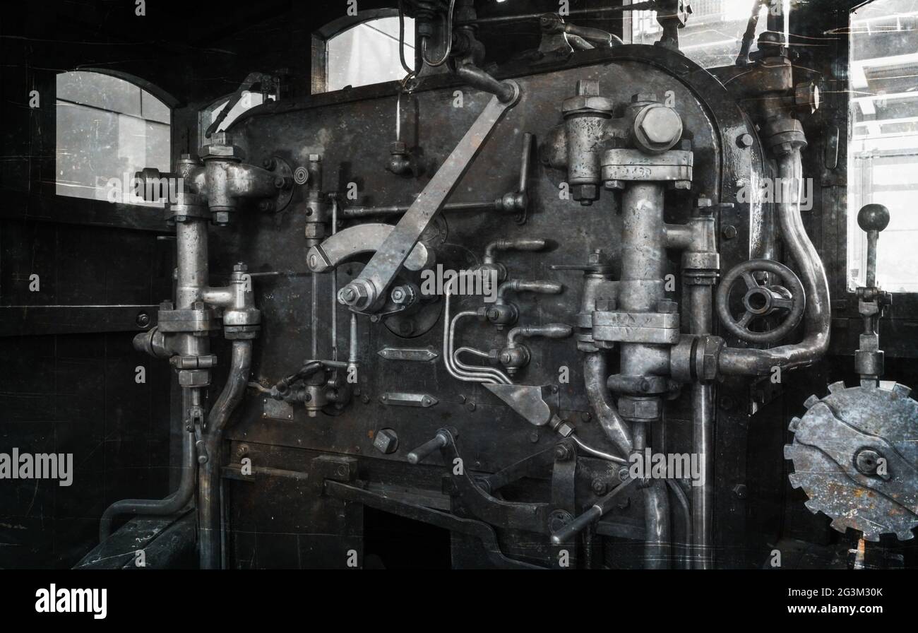 Vintage locomotive - Controling an old train Stock Photo - Alamy