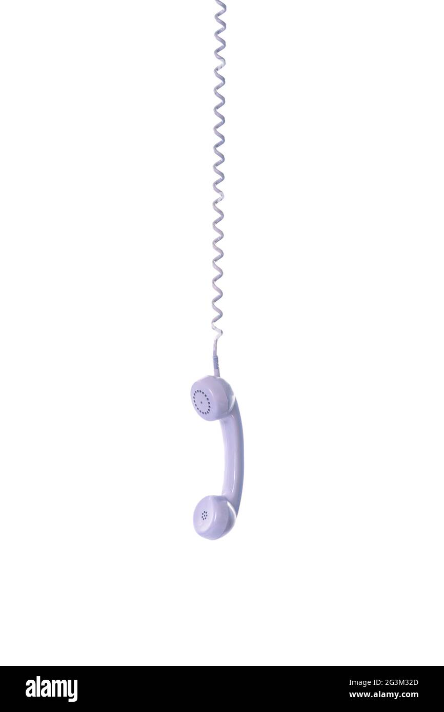 Vintage telephone hanging on a white background Stock Photo - Alamy