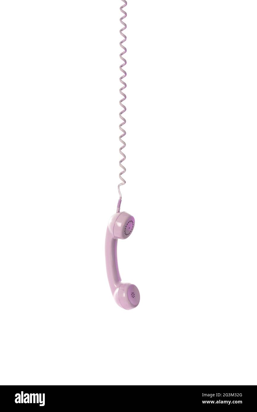 Vintage telephone hanging on a white background Stock Photo - Alamy