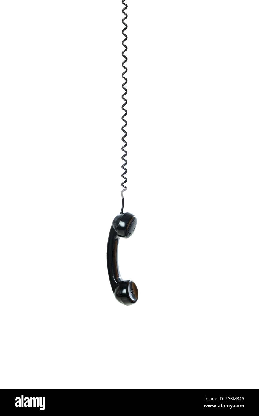 Vintage telephone hanging on a white background Stock Photo - Alamy