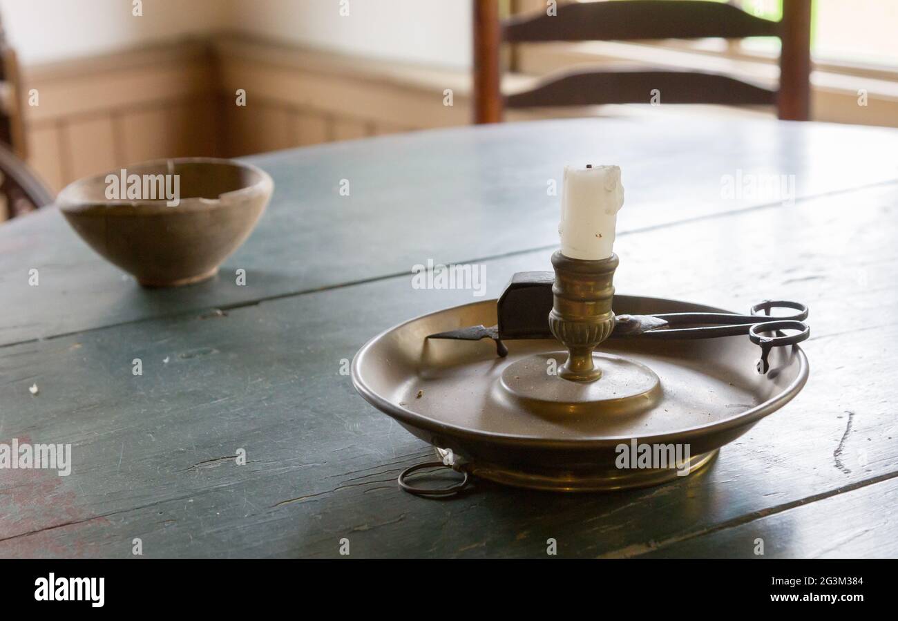 Candle burning in old fashioned hi-res stock photography and images - Alamy