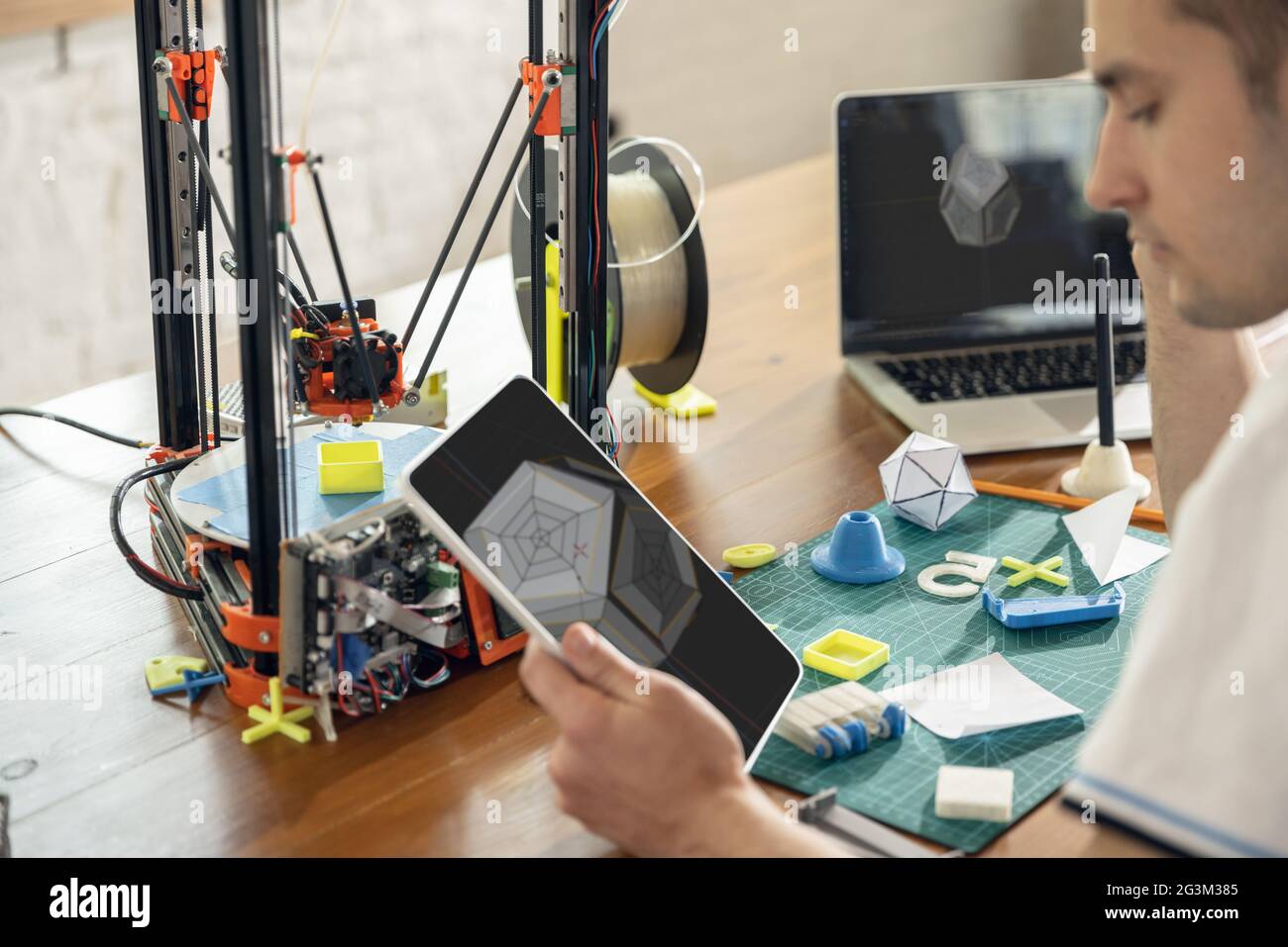 New generation of 3D Printing Machine printing a piece of plastic. For ...