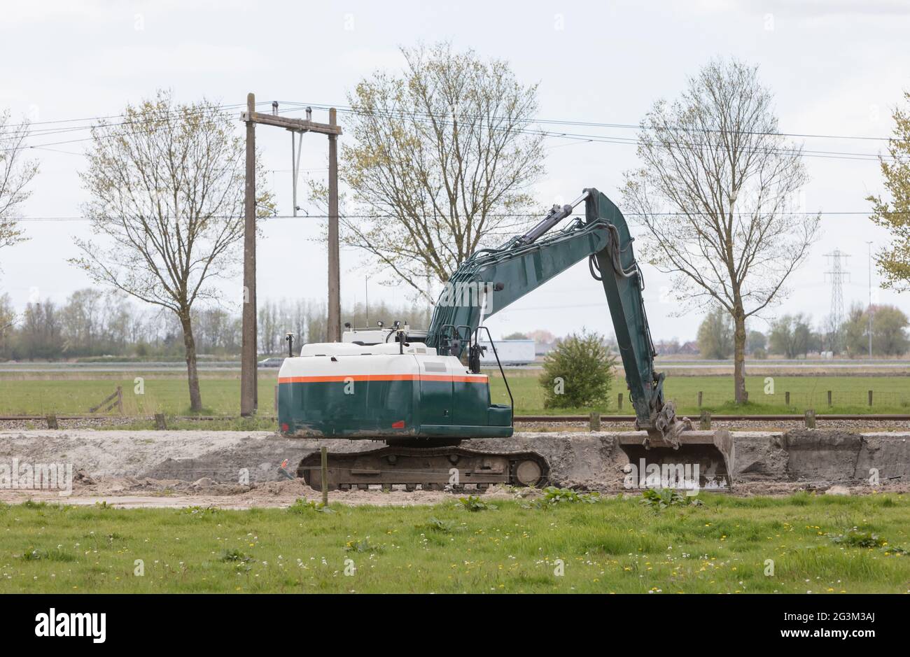 Excavator in construction site Stock Photo - Alamy