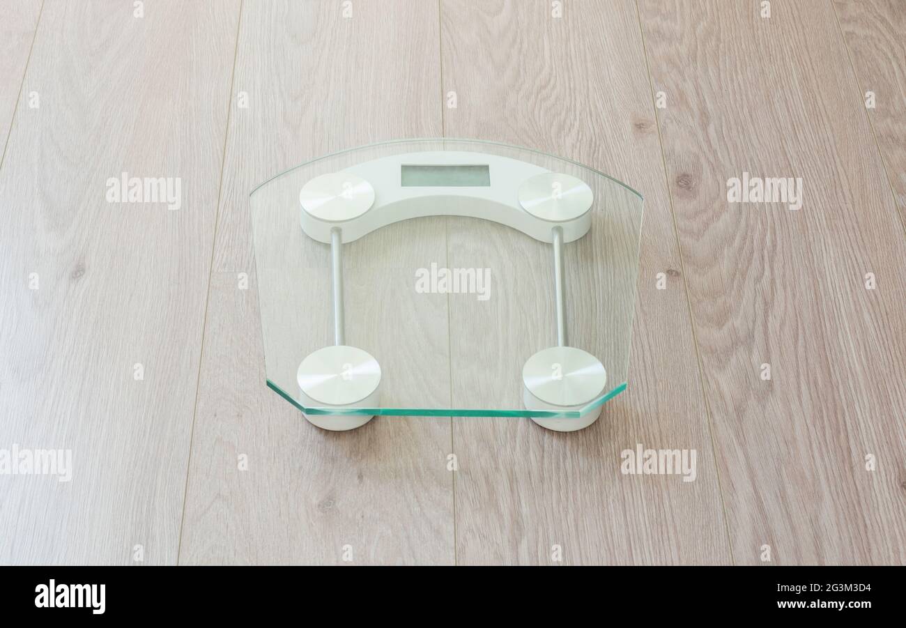 Glass weight scale Stock Photo - Alamy