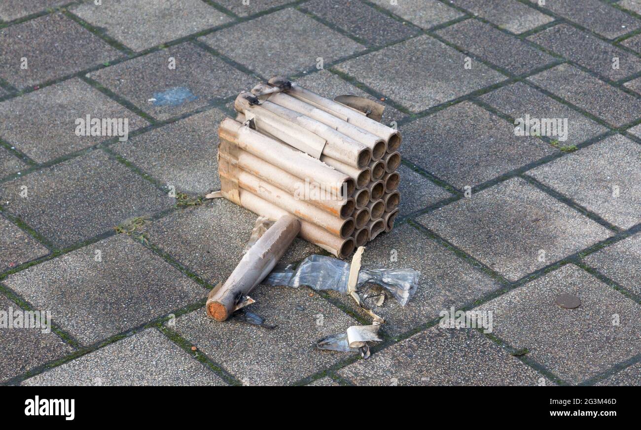 Used fireworks on te street Stock Photo - Alamy