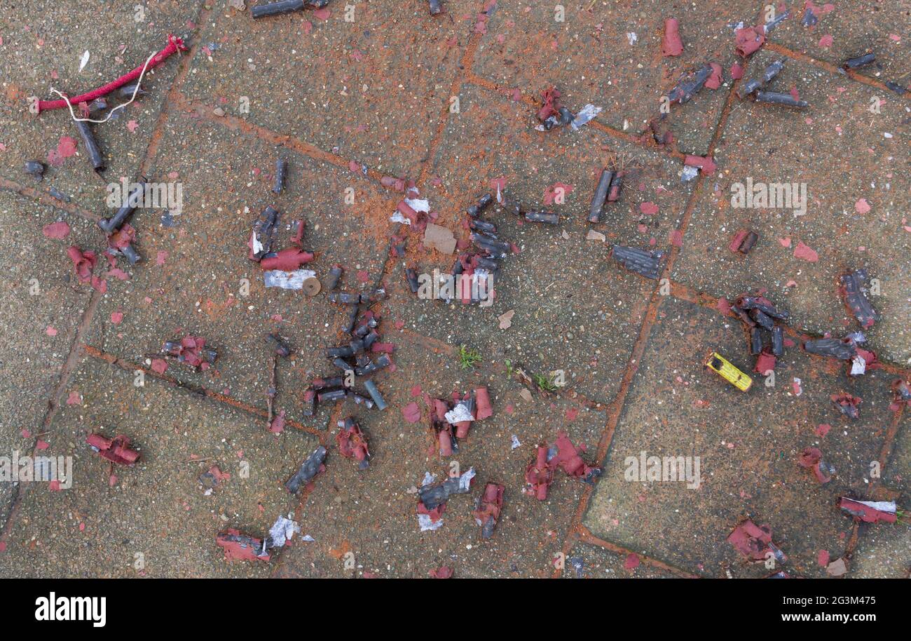 Used fireworks on te street Stock Photo - Alamy