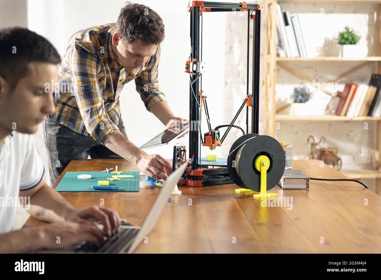 New generation of 3D Printing Machine printing a piece of plastic. For ...