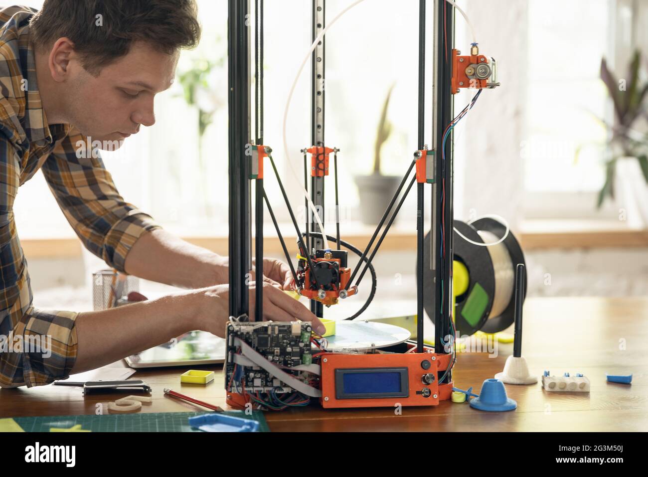 New generation of 3D Printing Machine printing a piece of plastic. For ...