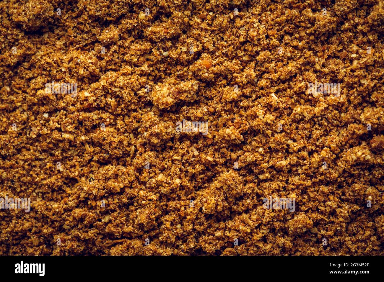 Ground nutmeg powder macro Background Stock Photo - Alamy