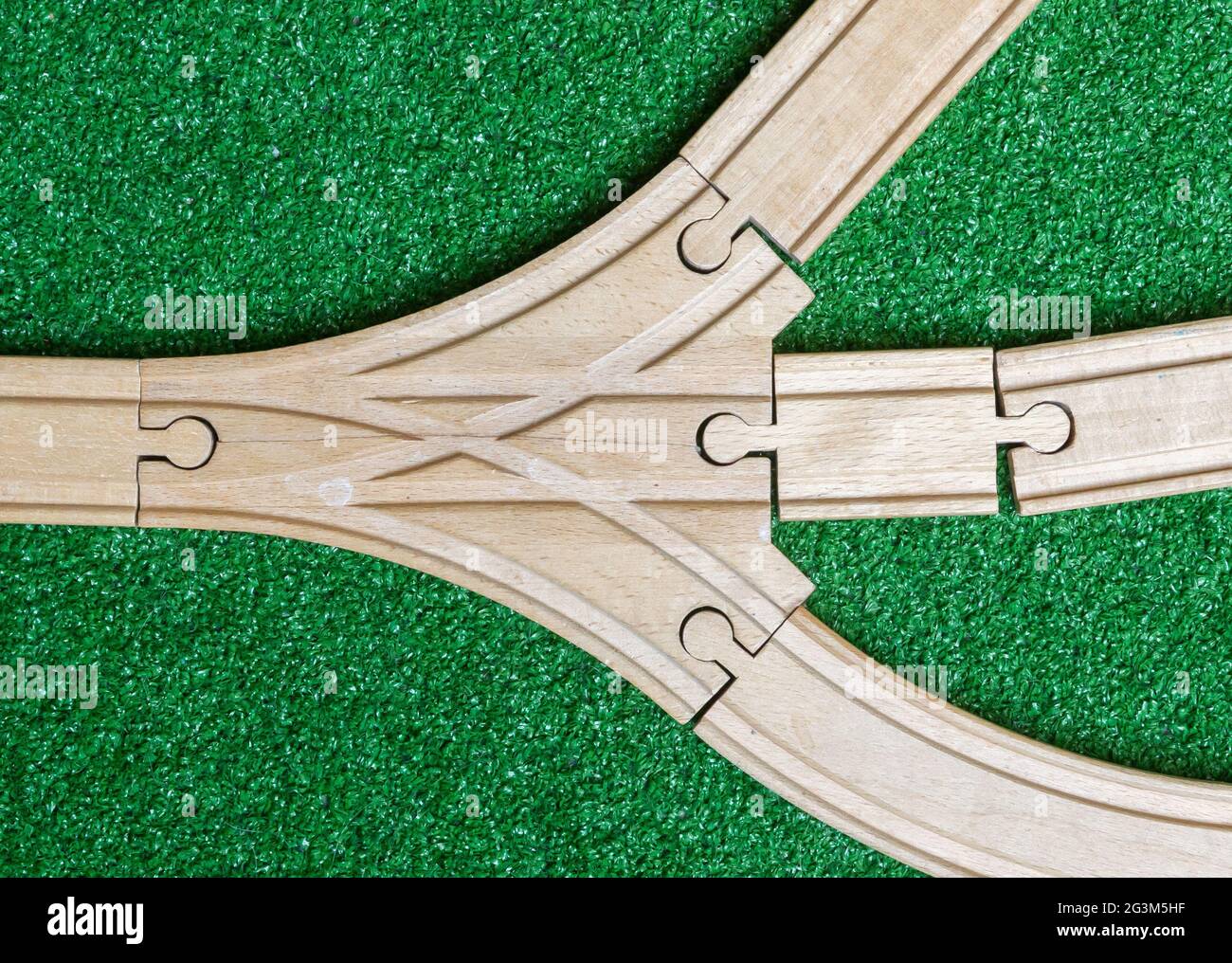 Childrens toy, wooden train track, junction Stock Photo - Alamy