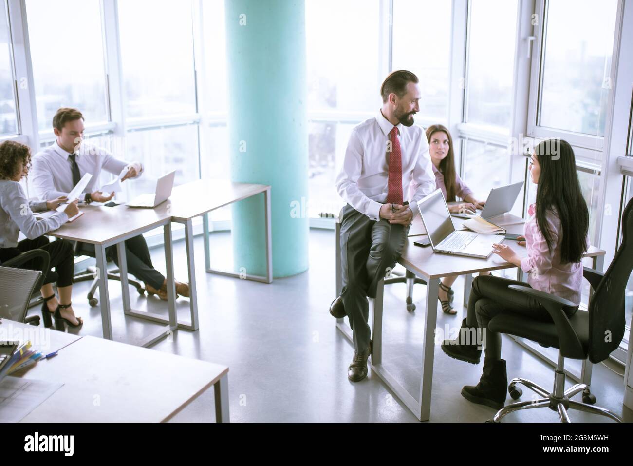 Coworkers thinking hi-res stock photography and images - Alamy