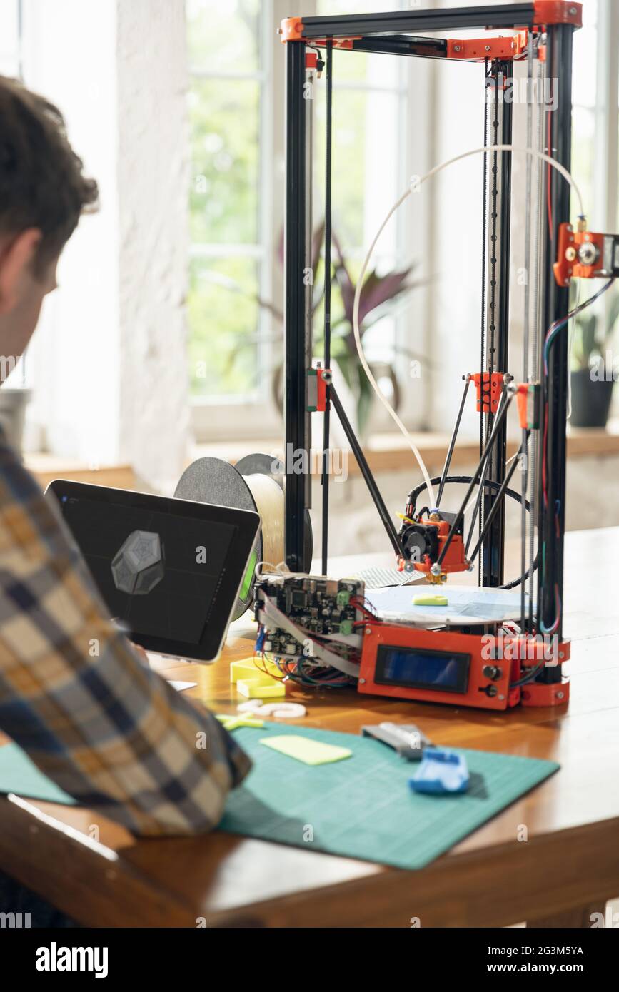 New generation of 3D Printing Machine printing a piece of plastic. For ...