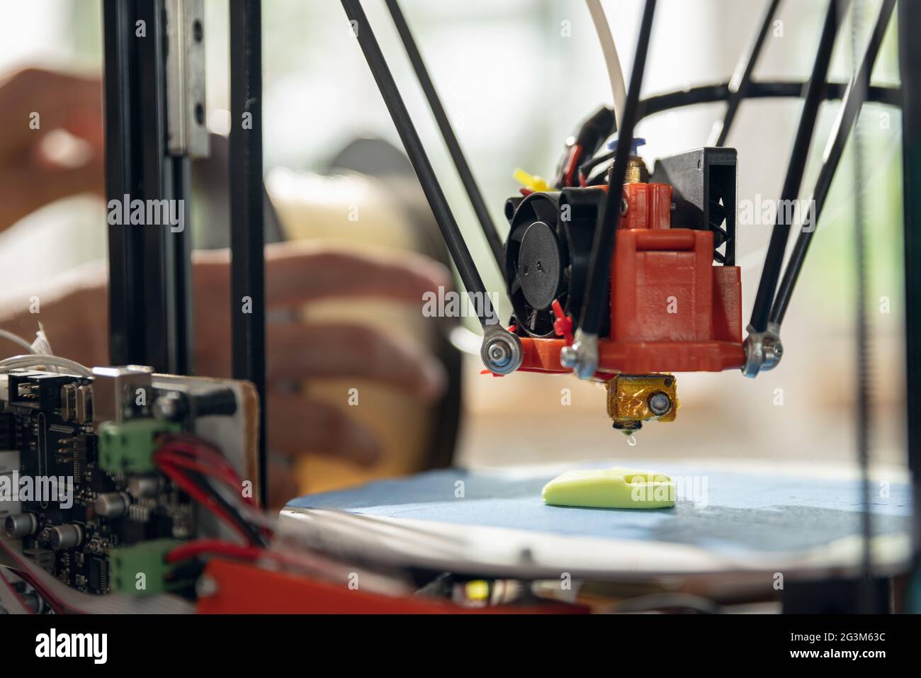 New generation of 3D Printing Machine printing a piece of plastic. For ...