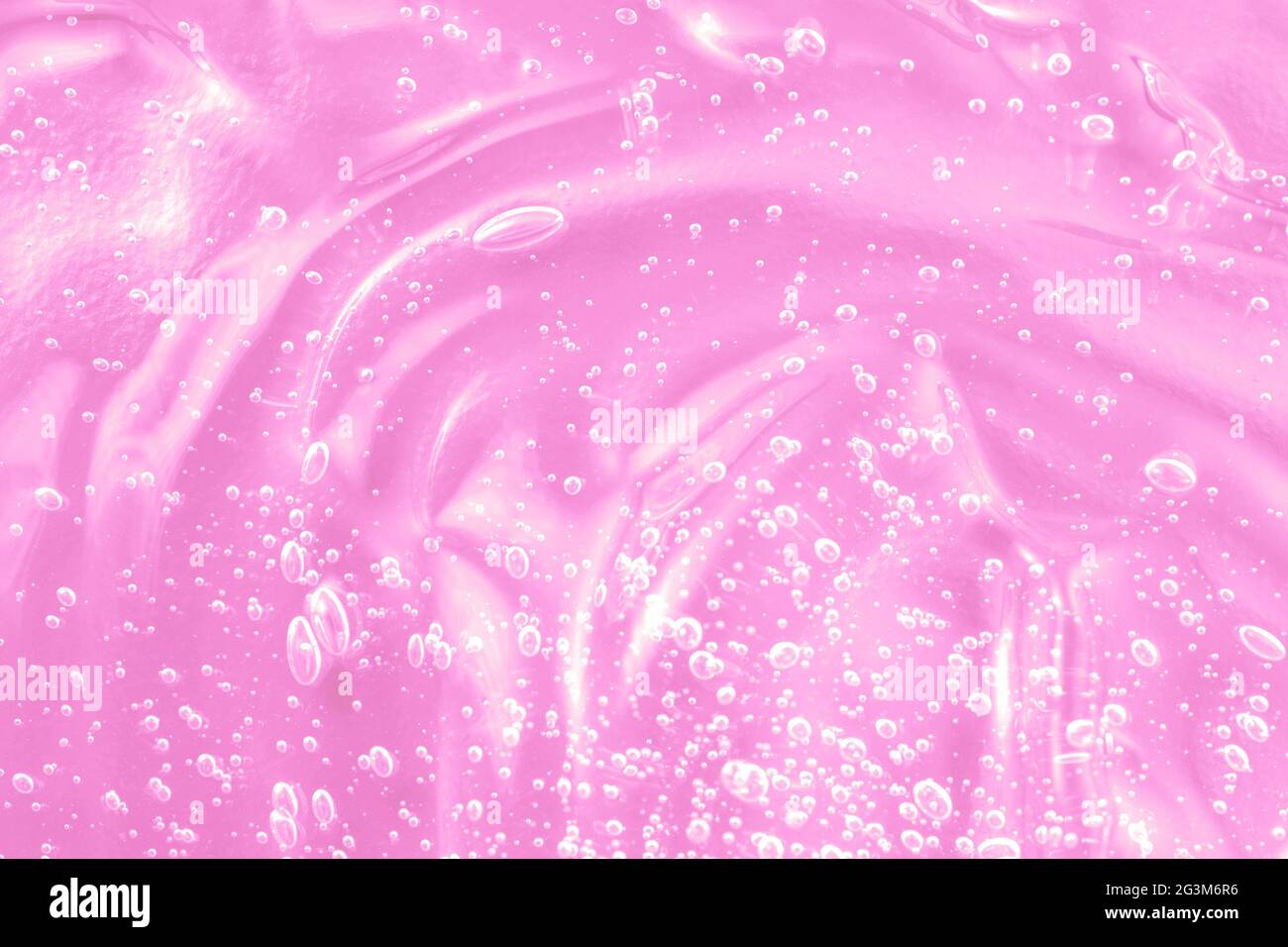 Hyaluronic acid with retinol and ceramide swatch. Pink toner smear ...