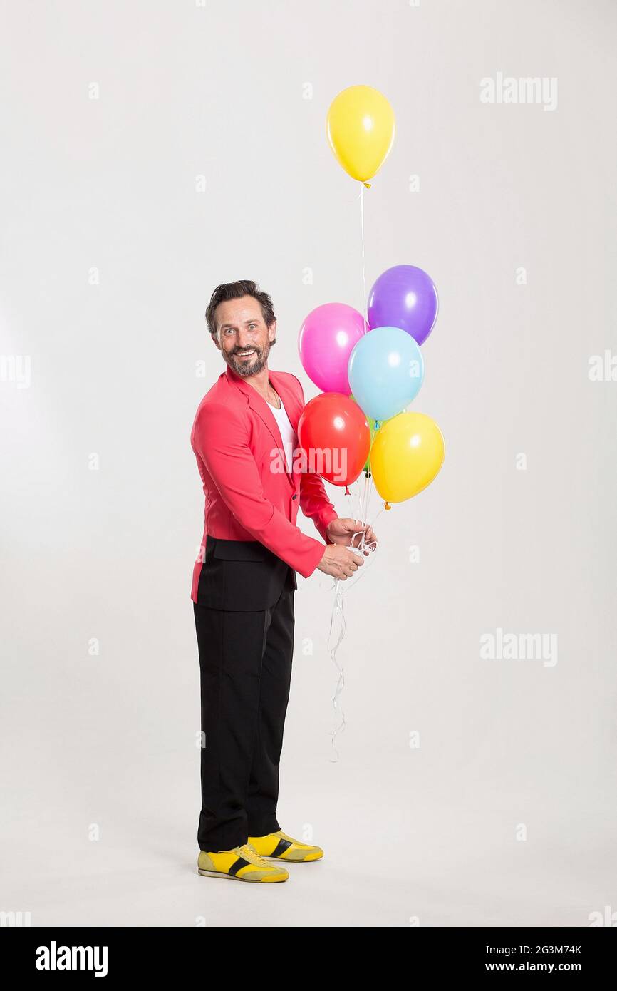 Balloons man hi-res stock photography and images - Alamy