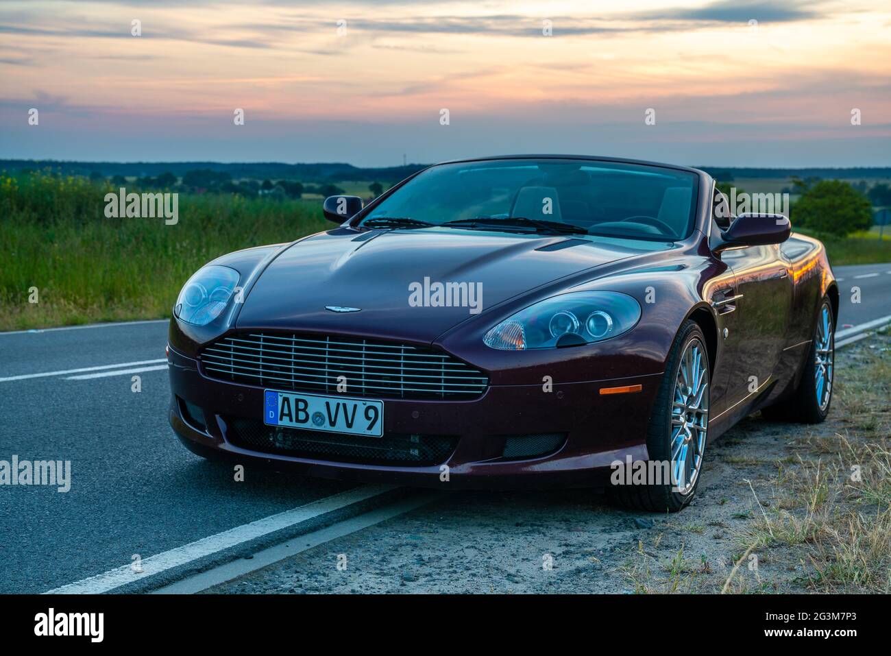 Beautiful, stylish Aston Martin DB9 Volante convertible on the road at ...