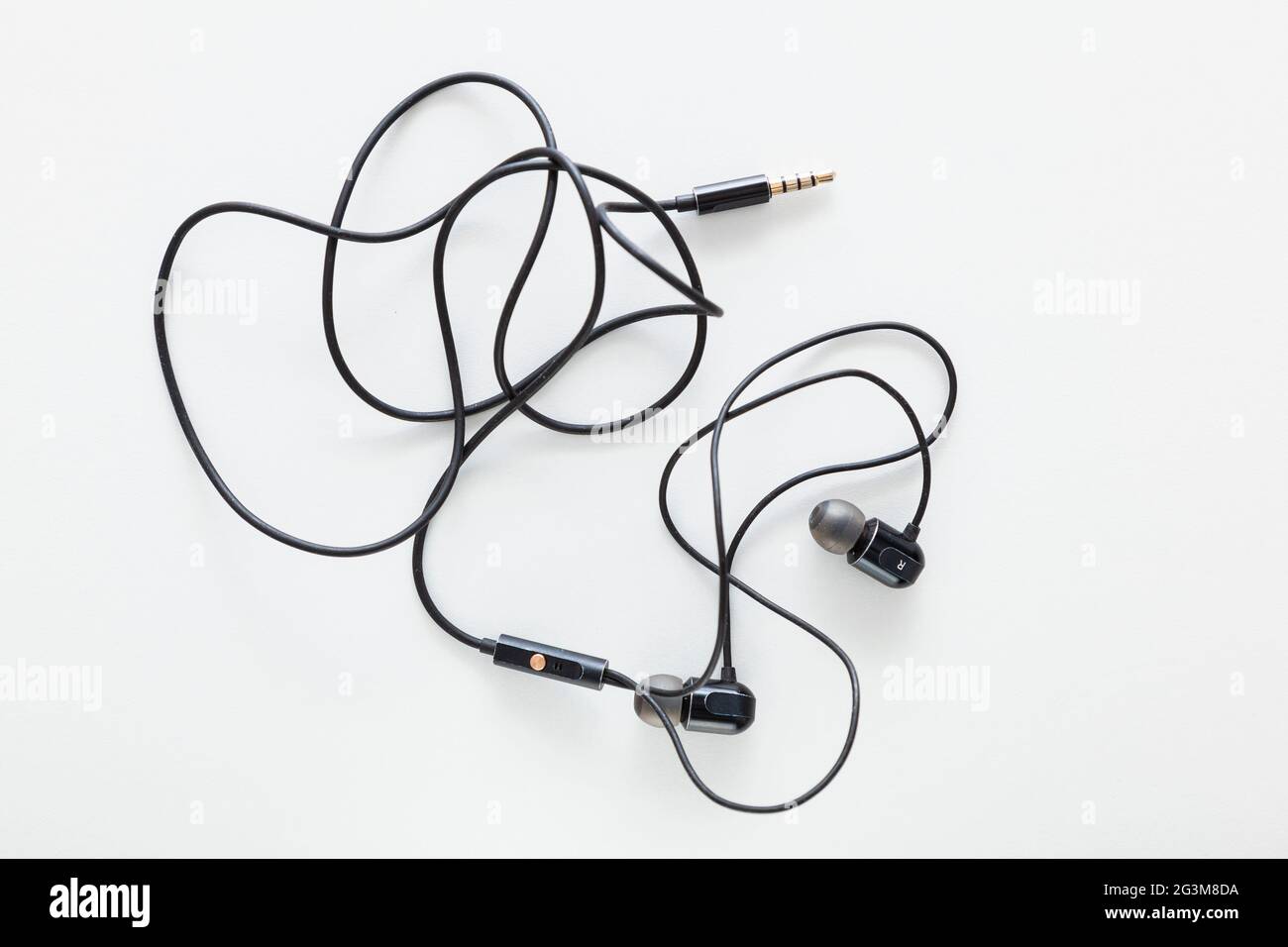 Wired silicone earphones with jack plug isolated on white background ...