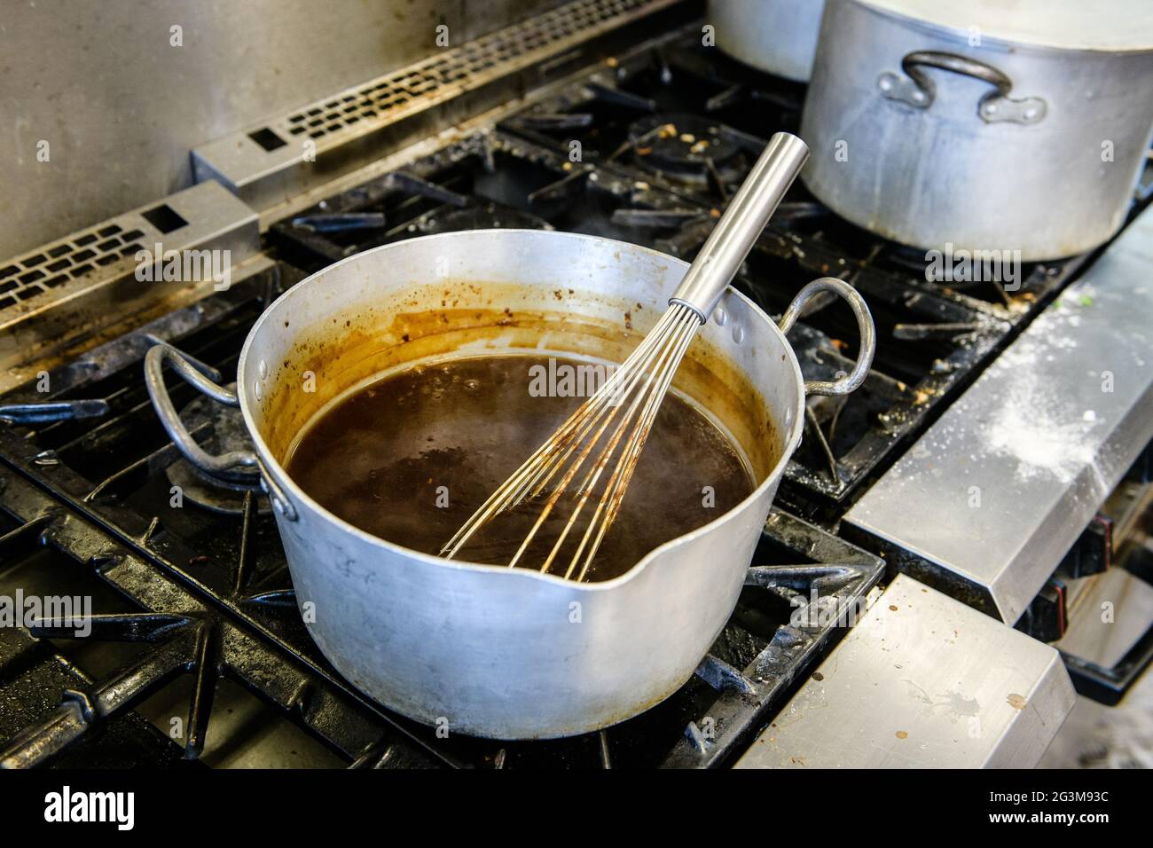 Heating up gravy hi-res stock photography and images - Alamy