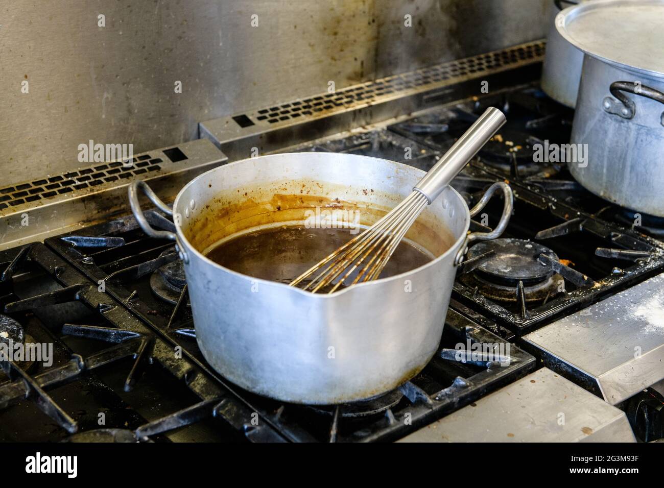 Heating up gravy hi-res stock photography and images - Alamy