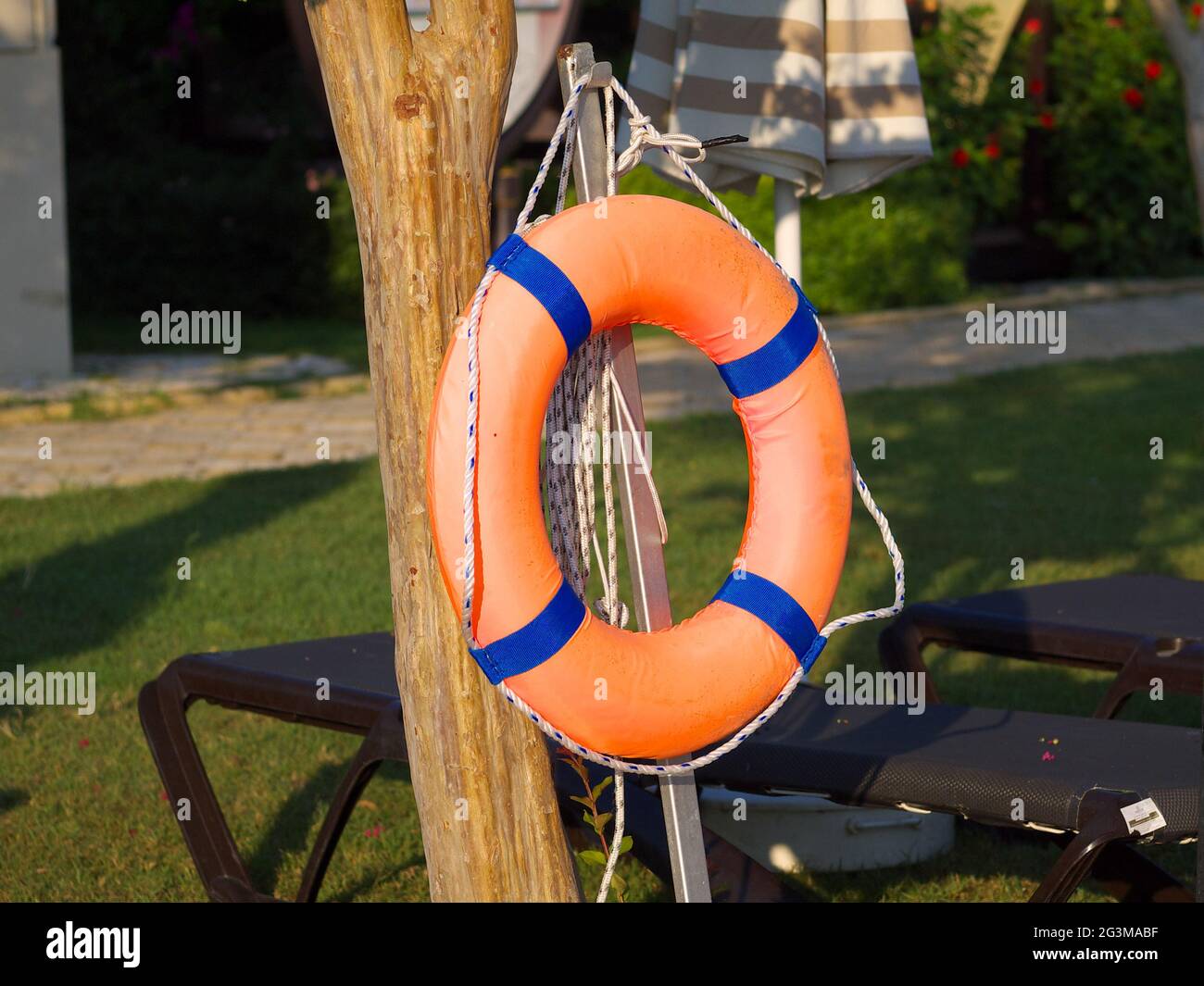 orange lifeline near the outdoor swimming pool Stock Photo - Alamy