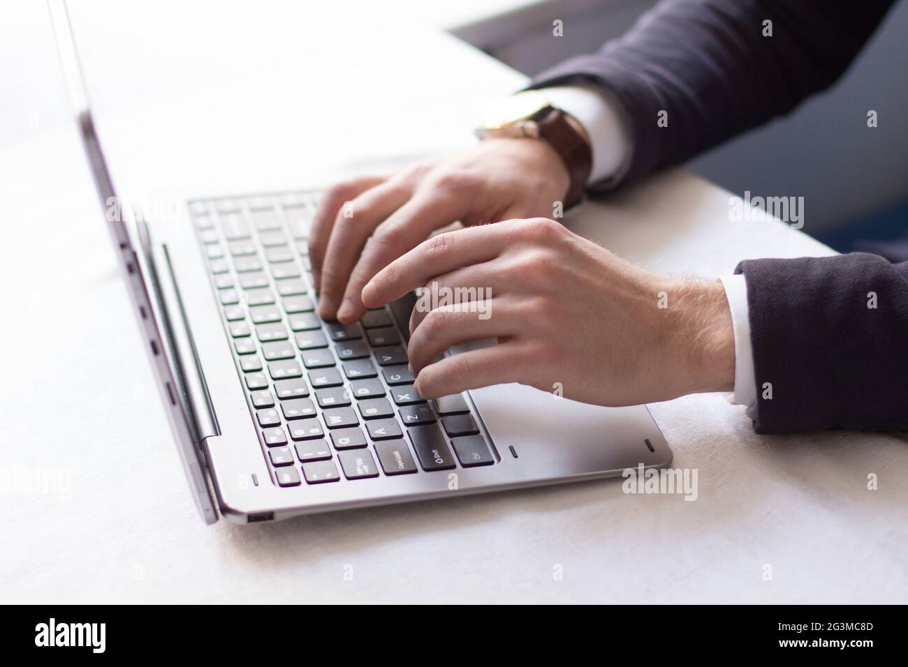 Closeup of businessman typing on laptop Stock Photo - Alamy