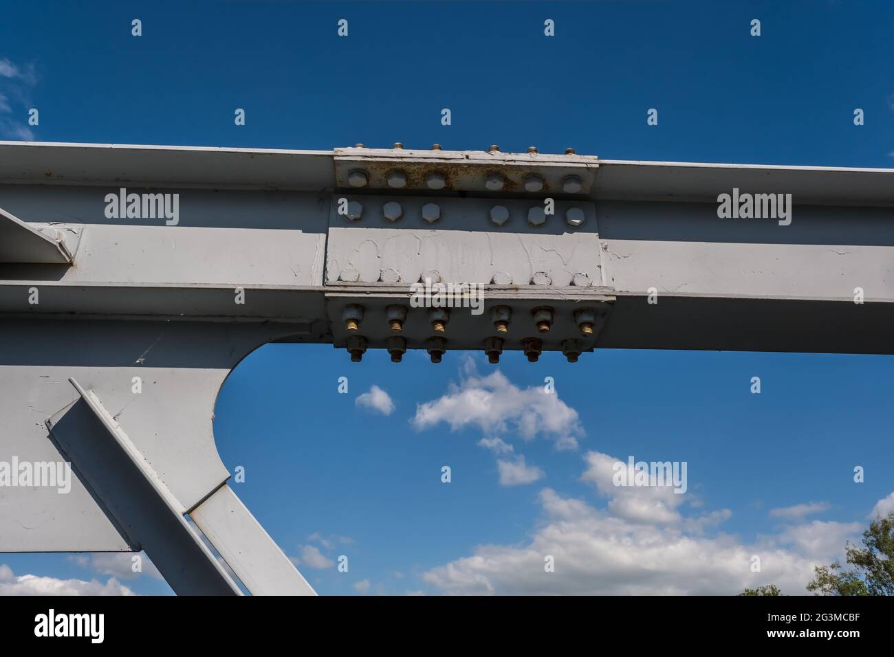 iron steel frame construction of bridge on blue sky background. bridge ...