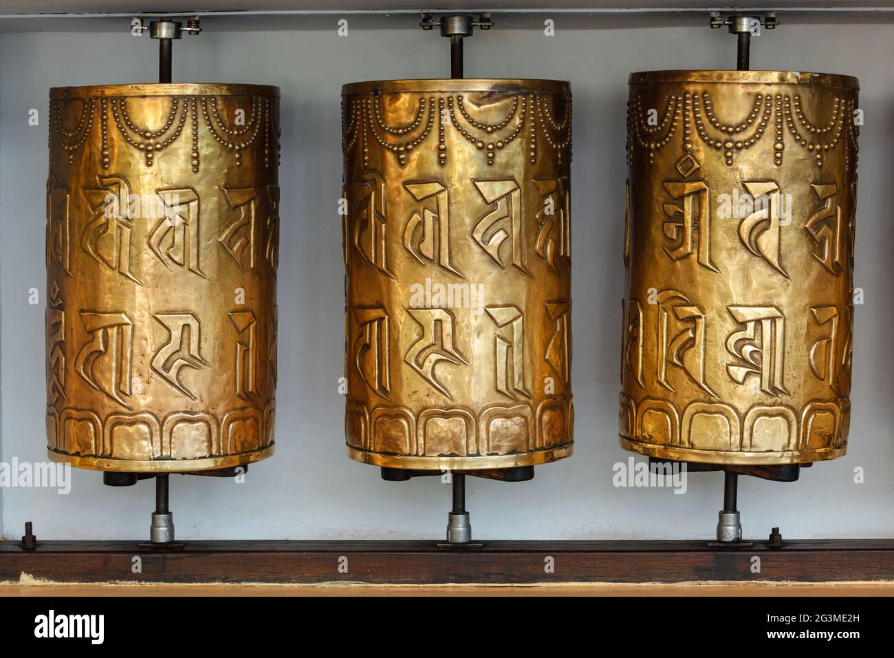 Buddhist prayer wheels Stock Photo - Alamy