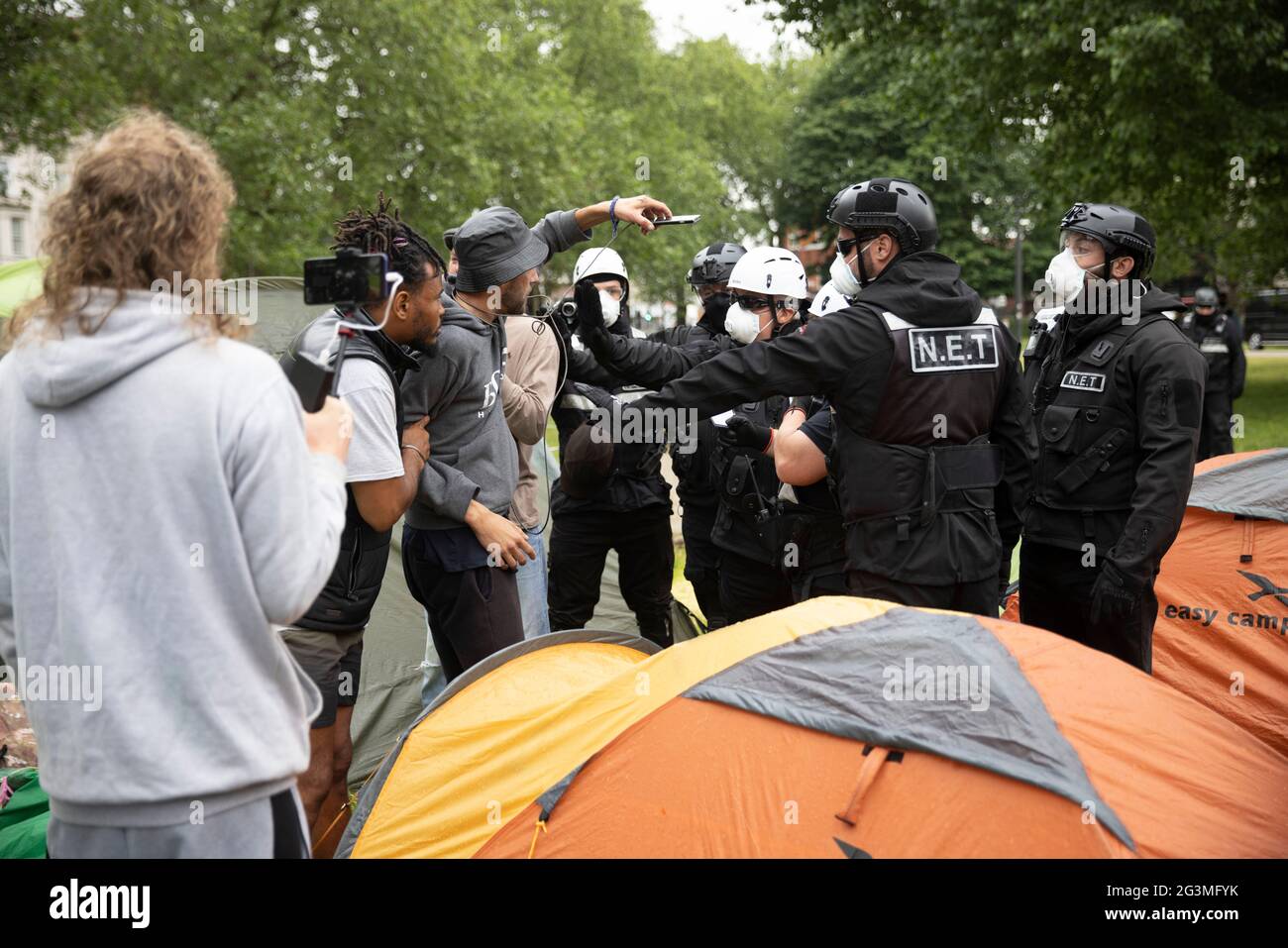 London, UK. 17th June, 2021. Police and enforcement officers try to ...