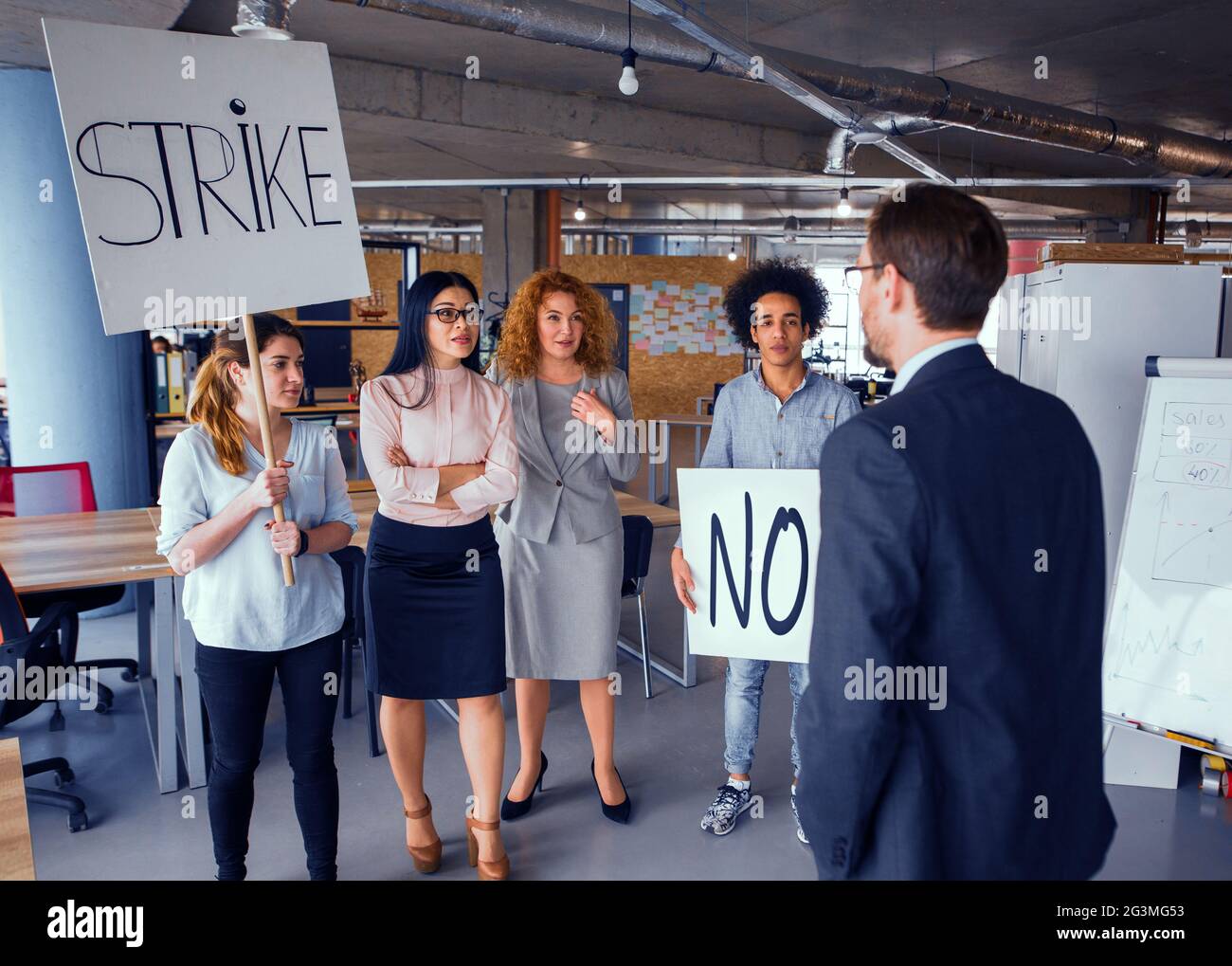 Loft style modern office, employees striking Stock Photo - Alamy