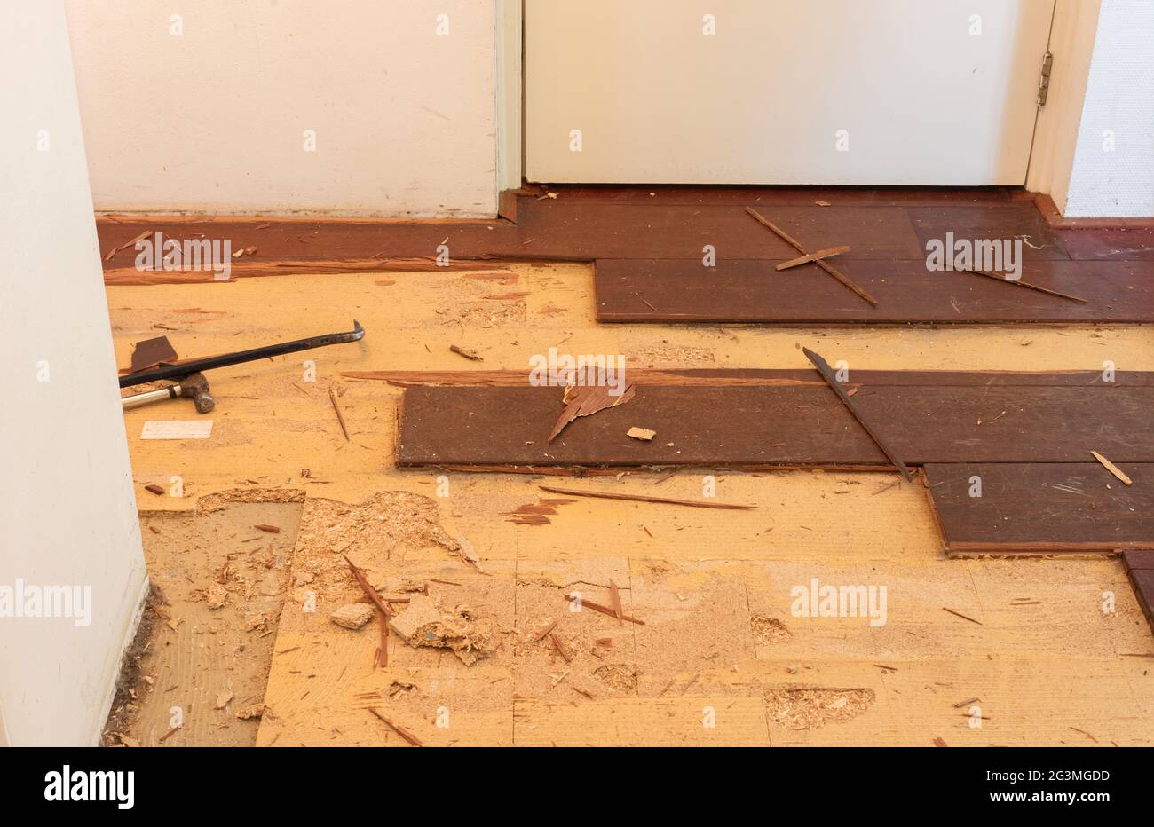 Breaking up a solid wooden floor Stock Photo - Alamy