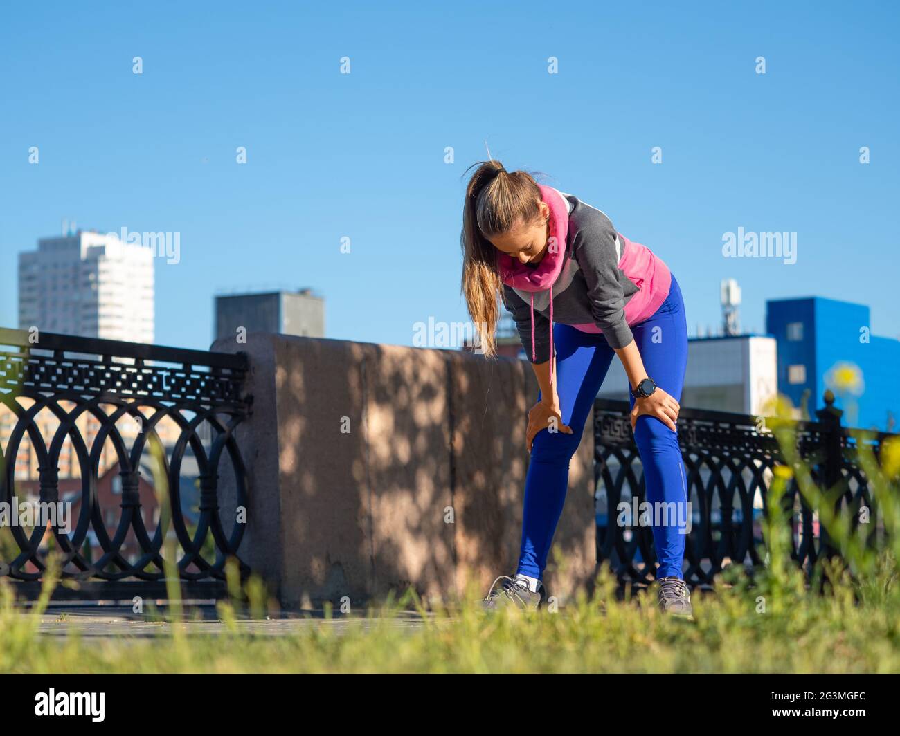 Photo of a woman resting after a run. Concept of a healthy lifestyle ...