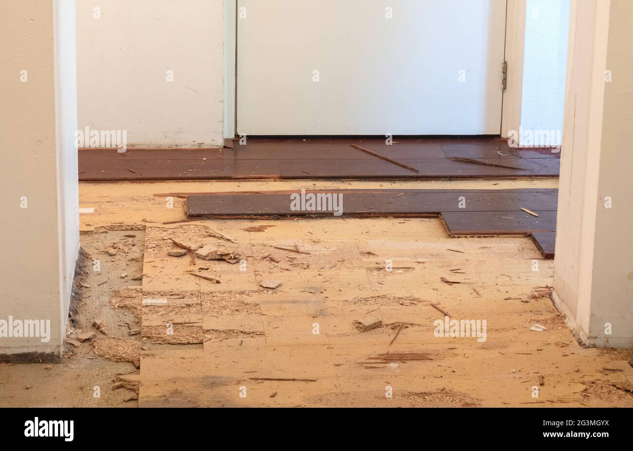 Breaking up a solid wooden floor Stock Photo - Alamy