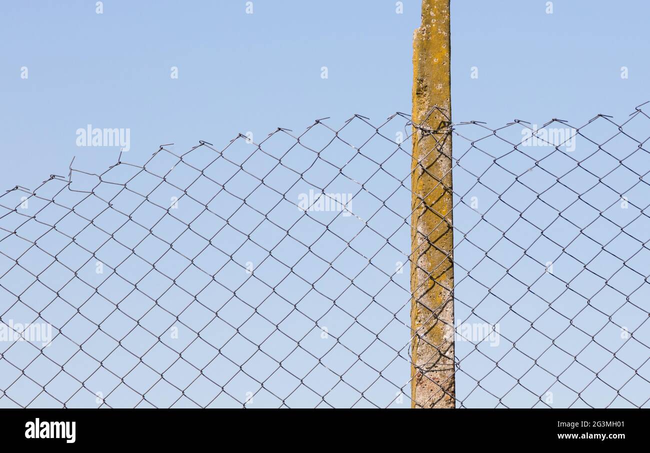 Simple metal fence Stock Photo - Alamy