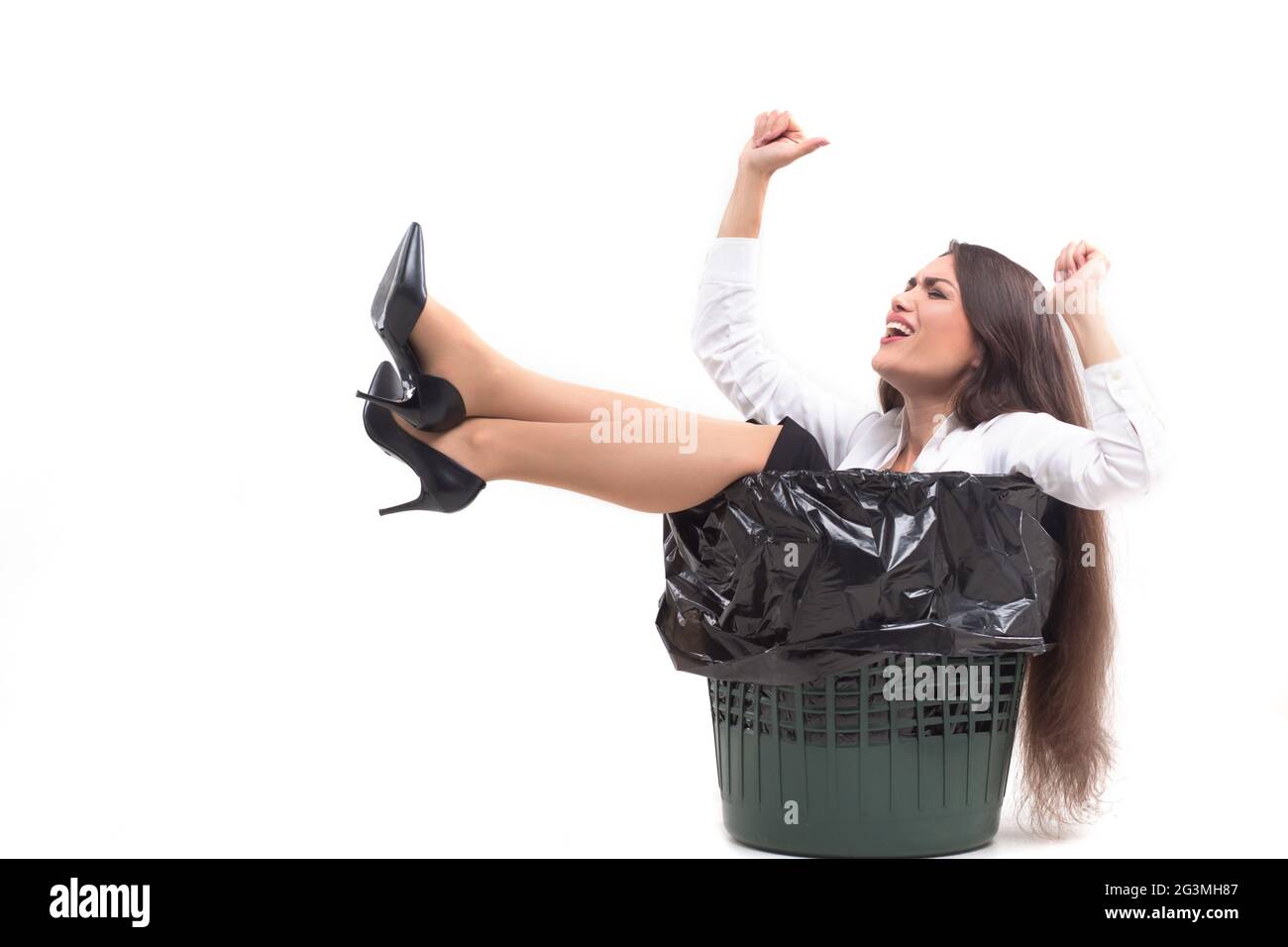 Young woman in trash can Cut Out Stock Images & Pictures - Alamy
