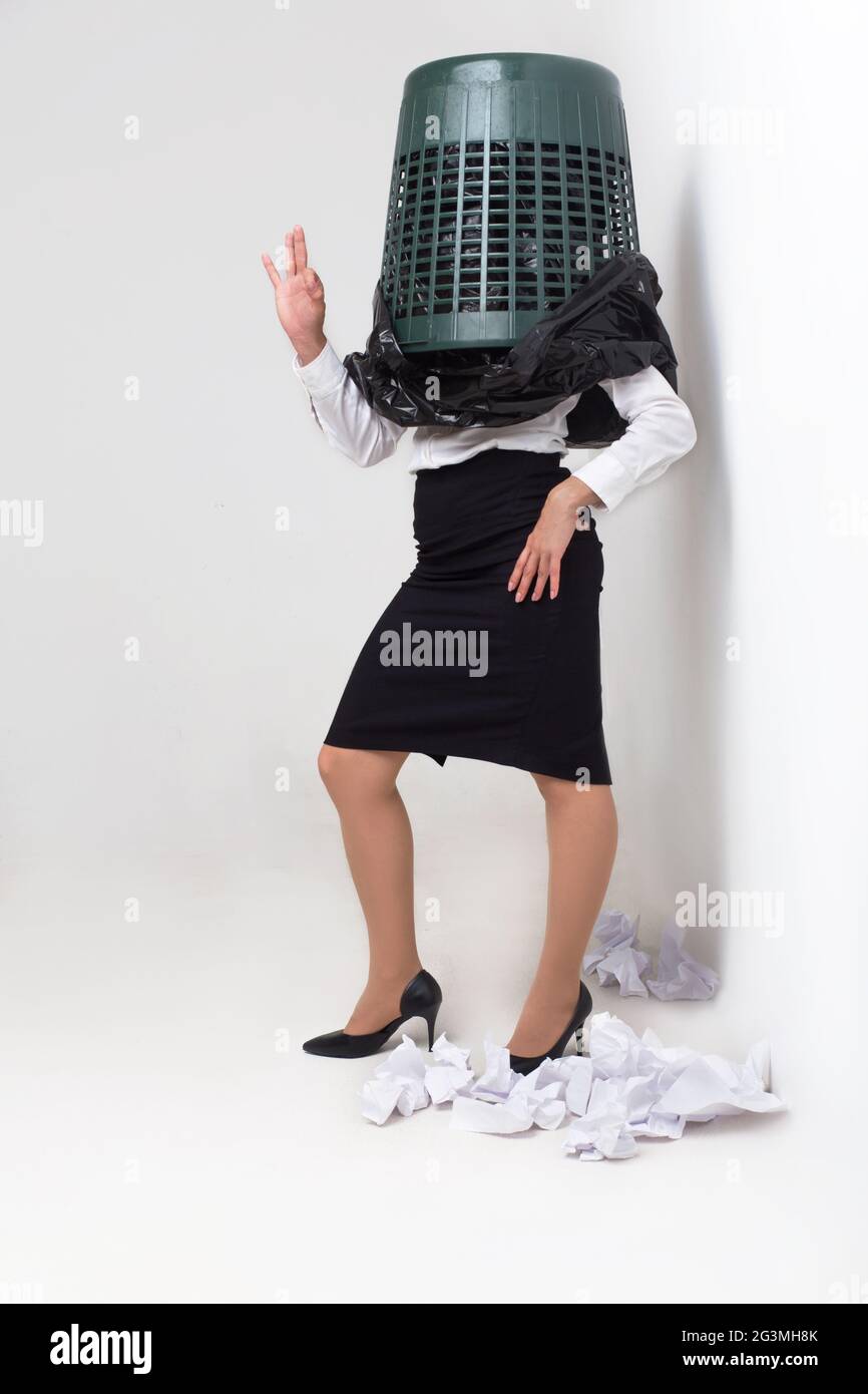 Silly girl with trash bin on her head Stock Photo - Alamy