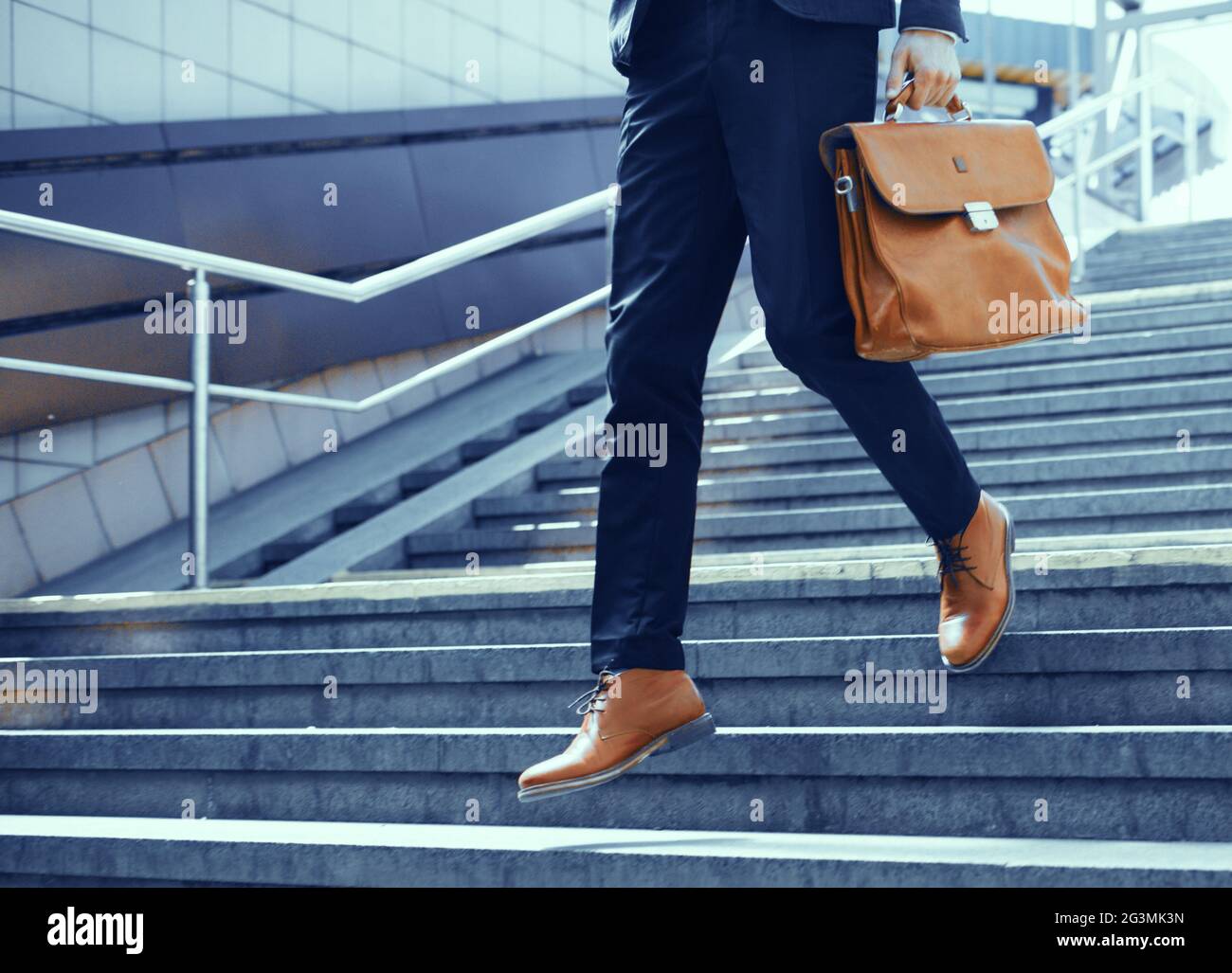 Businessman walking down street hi-res stock photography and images - Alamy