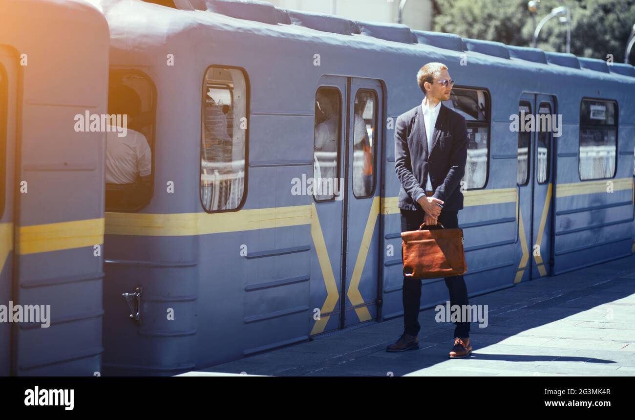 Man in commuter train subway hi-res stock photography and images - Alamy